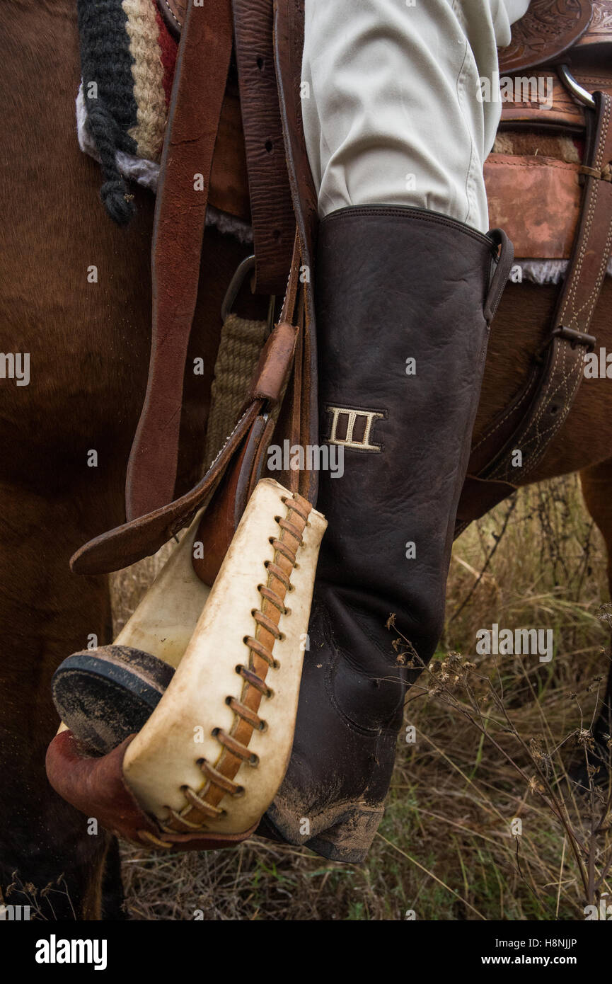Closeup of cowboy boot in stirrup on horseback Stock Photo - Alamy