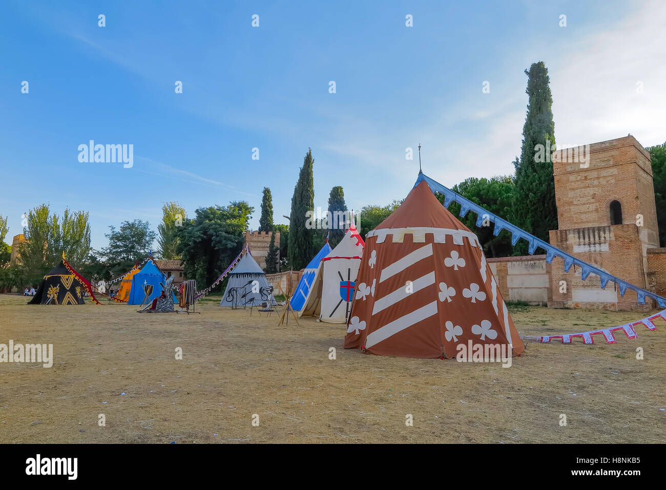 outdoor scene with some tents in the recreation of a medieval military ...