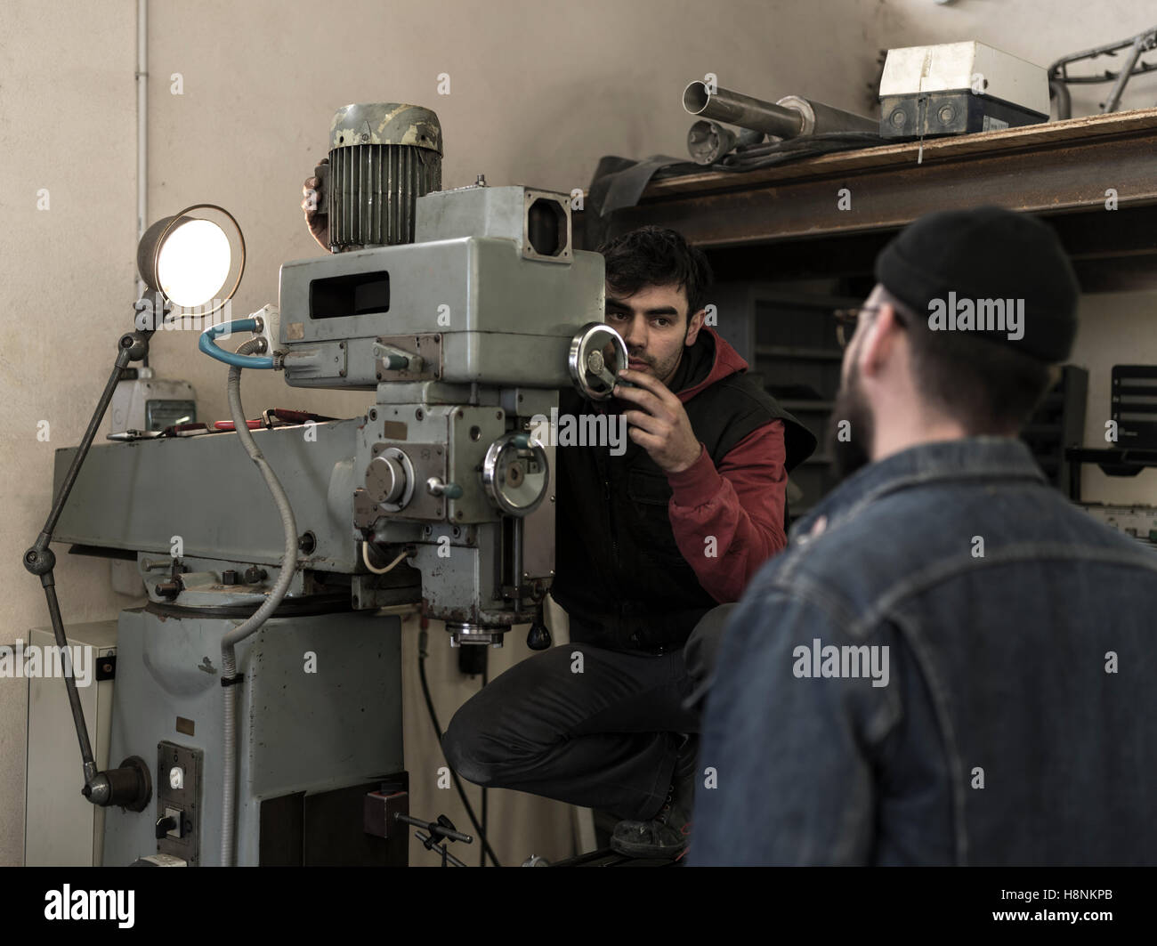 Men Working in metal workshop Stock Photo - Alamy