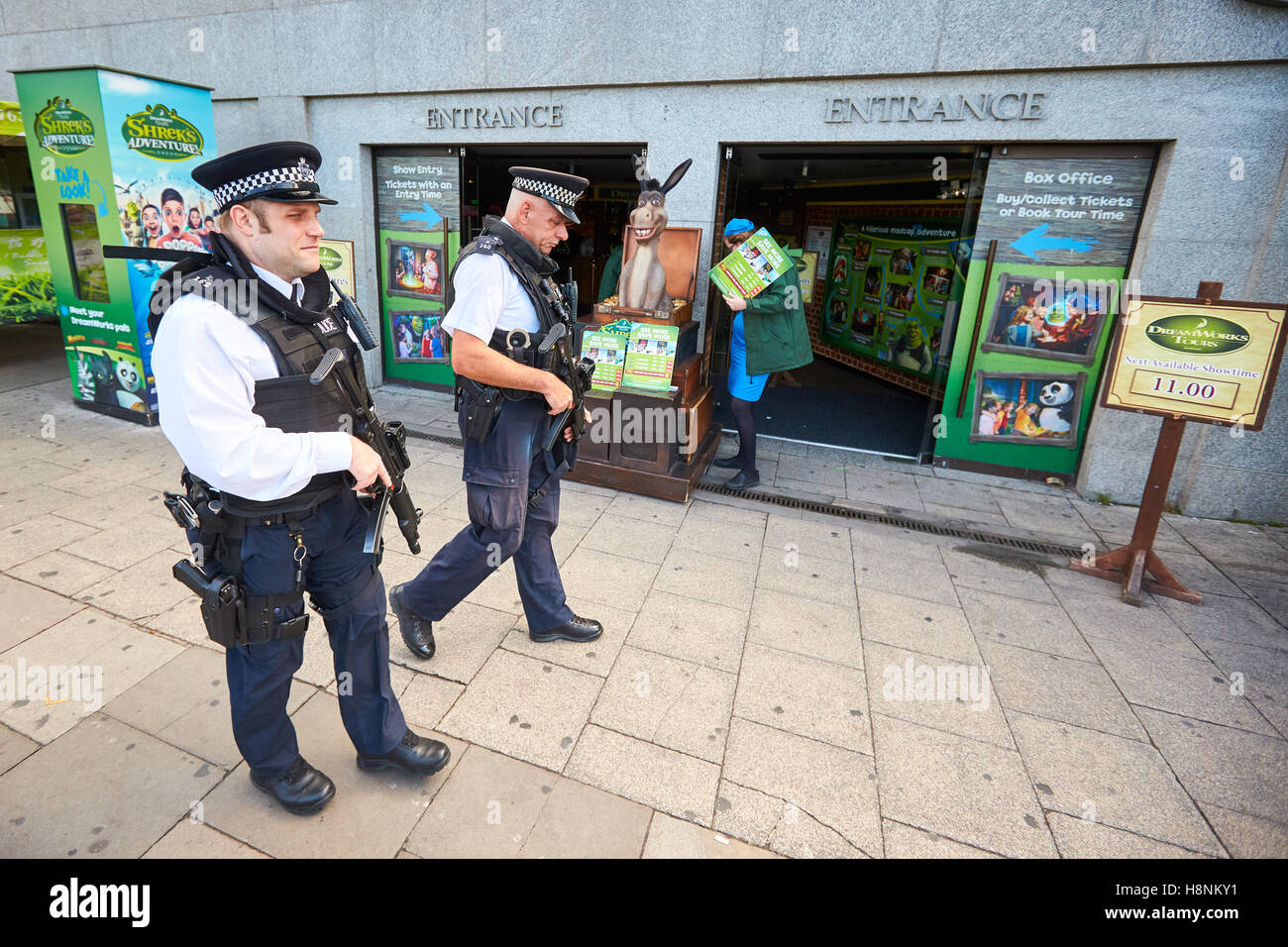Armed police patrol outside Shrek's Adventure tourist attraction at ...