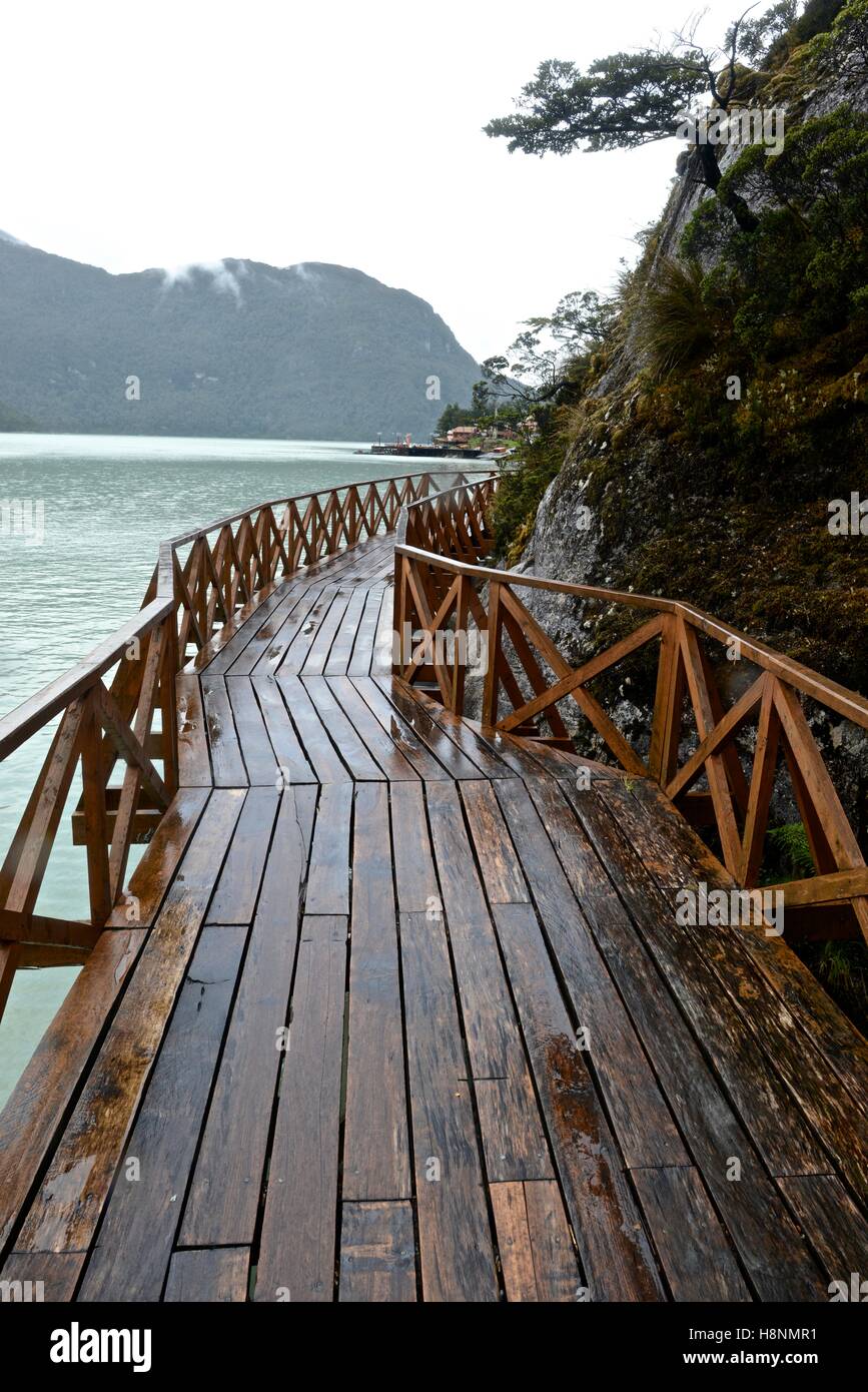 Traditional wood boardwalks in Caleta Tortel coastal village. Aysén ...