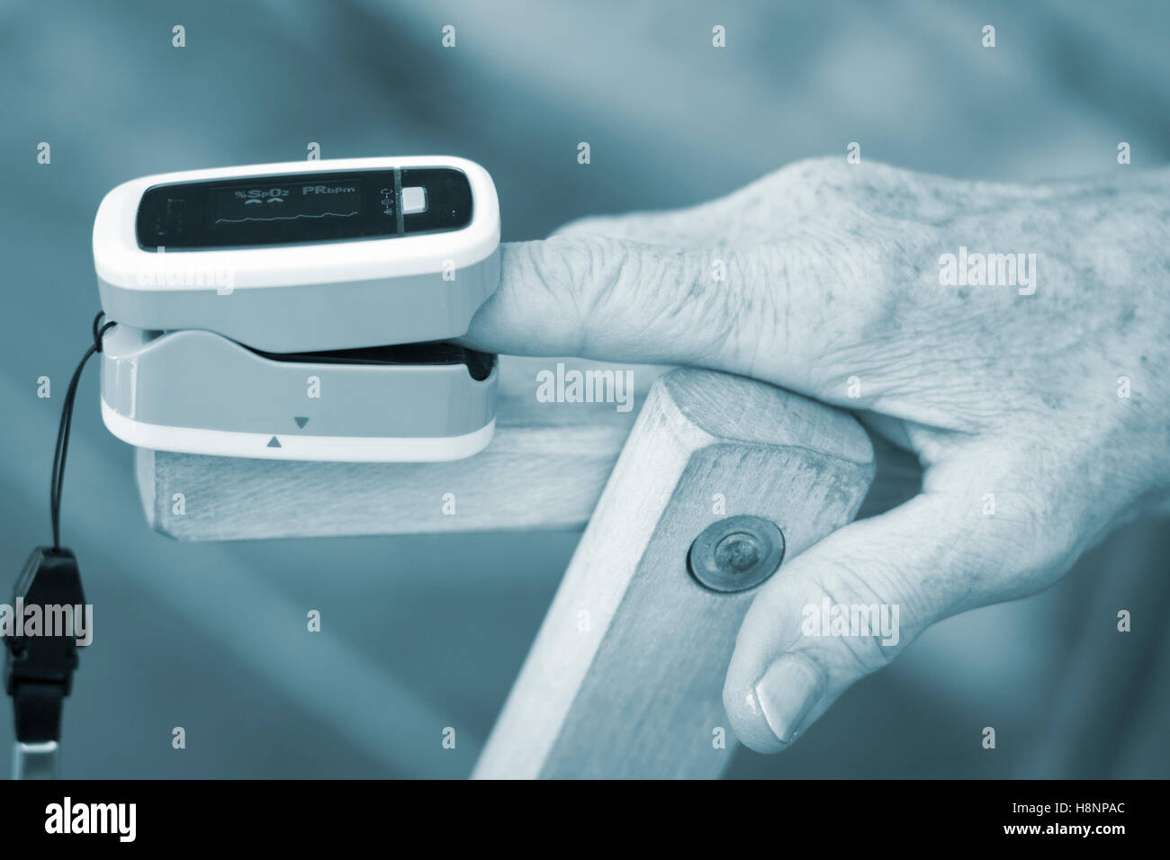 Portable hand held domestic cardiac finger pulse rate meter to show ...