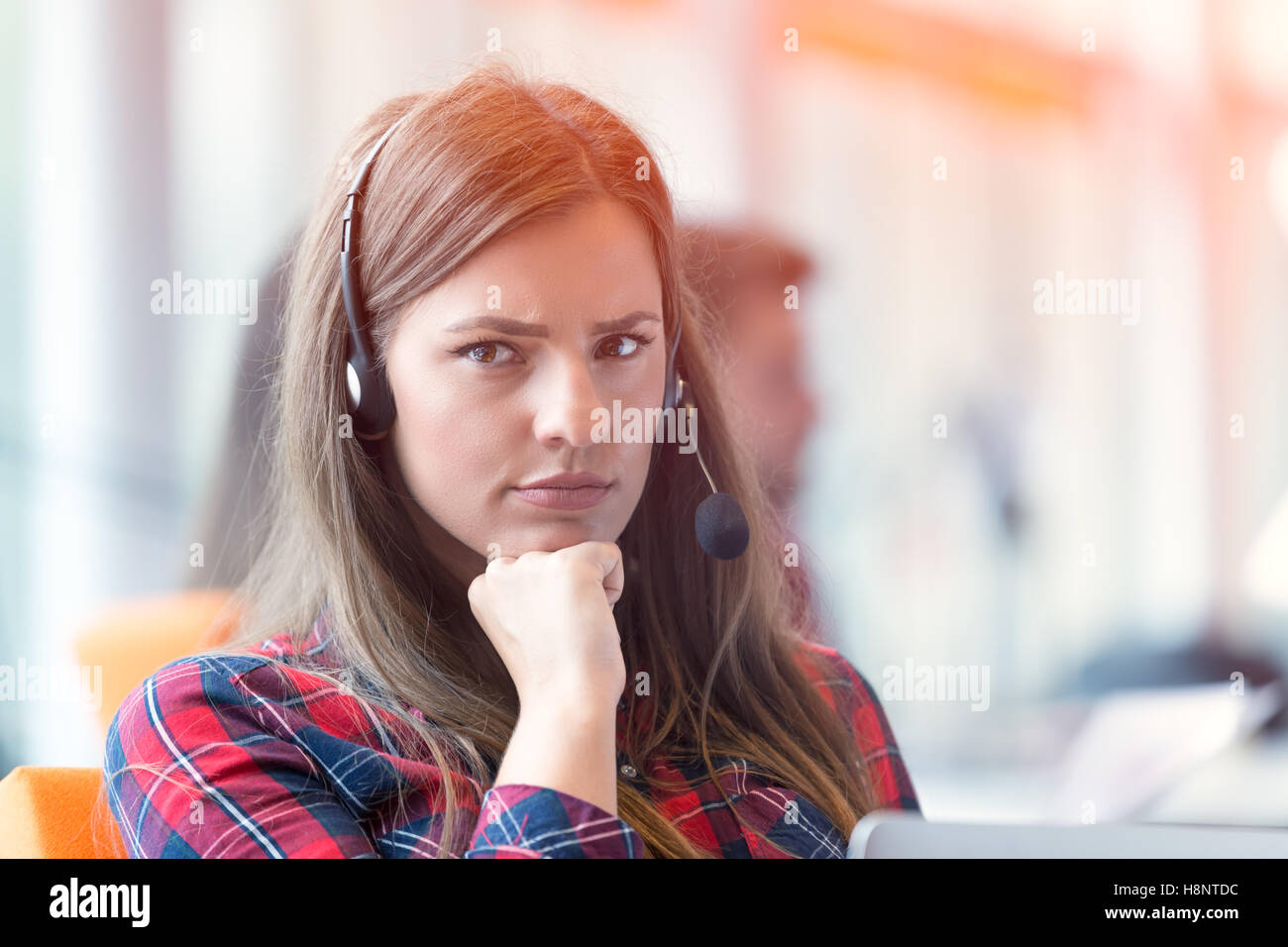 Close up plan of a smiling businesswoman in a call centre Stock Photo ...