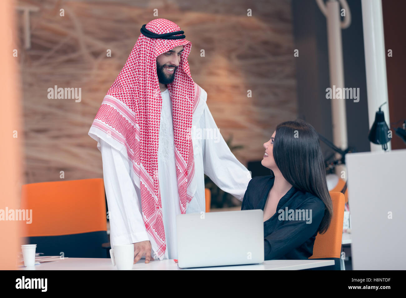 Multi ethnic business people at work in modern startup office Stock ...