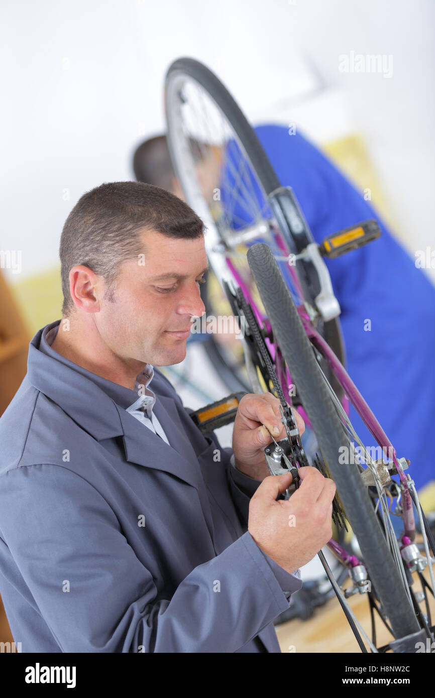 Fixing bike frame hi-res stock photography and images - Alamy