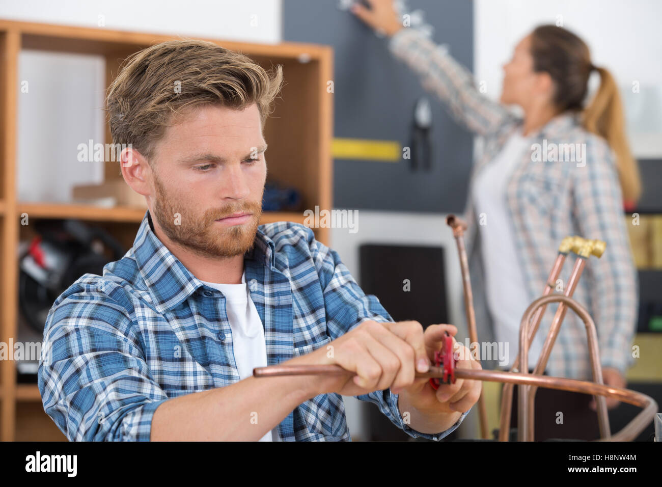 metalwork student girl training in workshop Stock Photo - Alamy