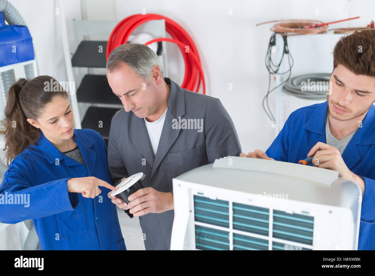 students in electronics class working on ac Stock Photo - Alamy