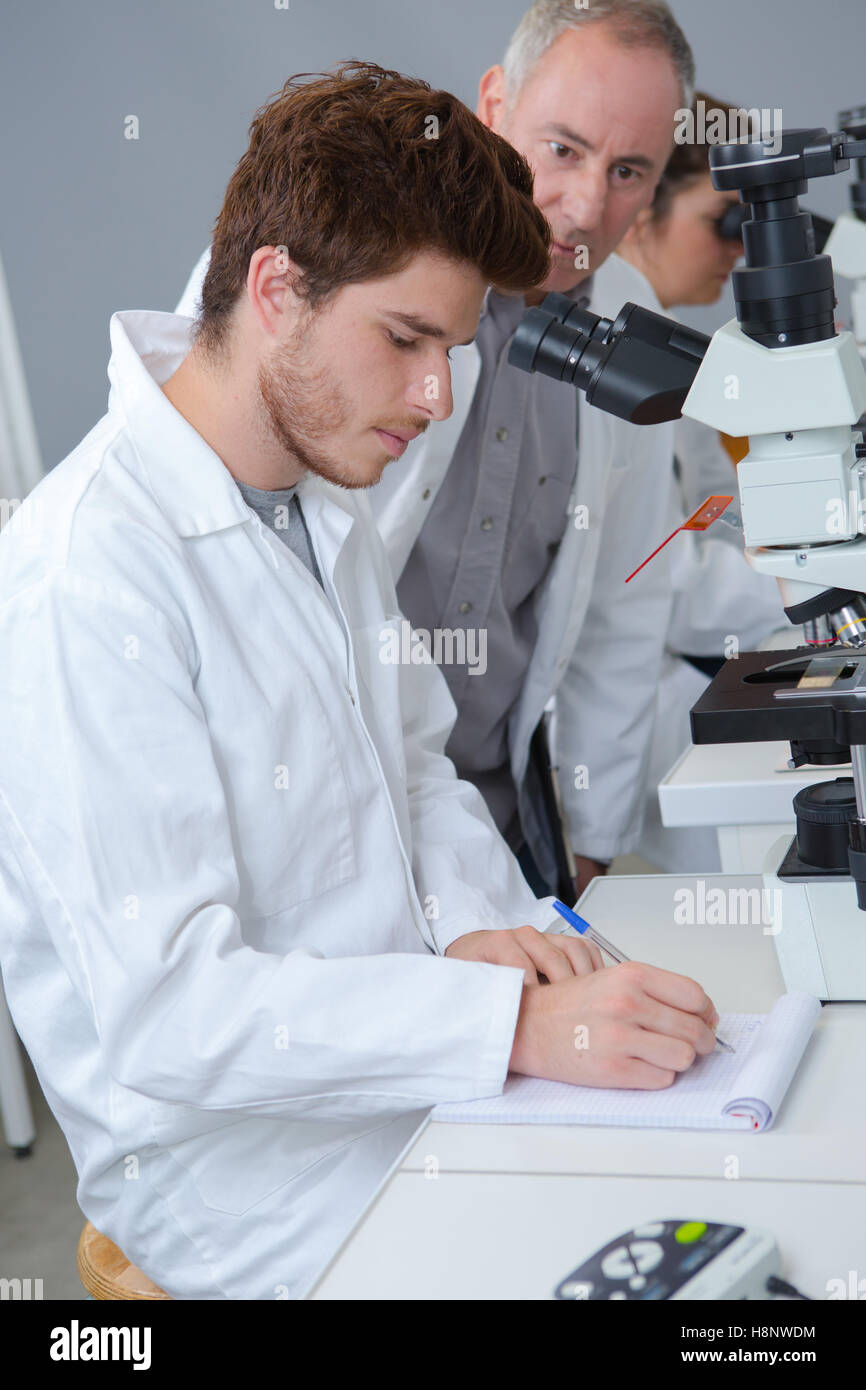 school boys with teacher in chemistry class Stock Photo - Alamy