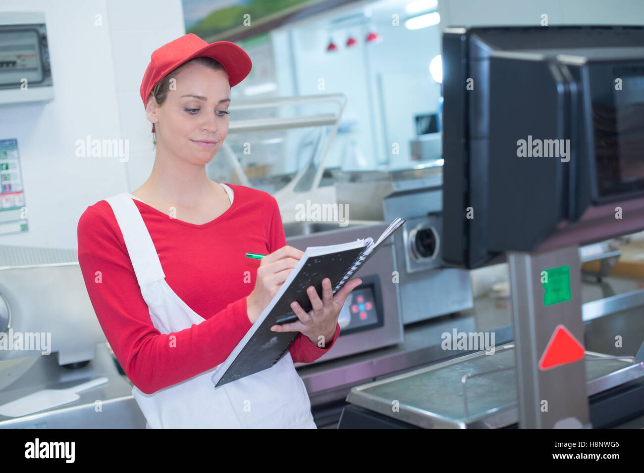 female worker in distribution warehouse Stock Photo - Alamy