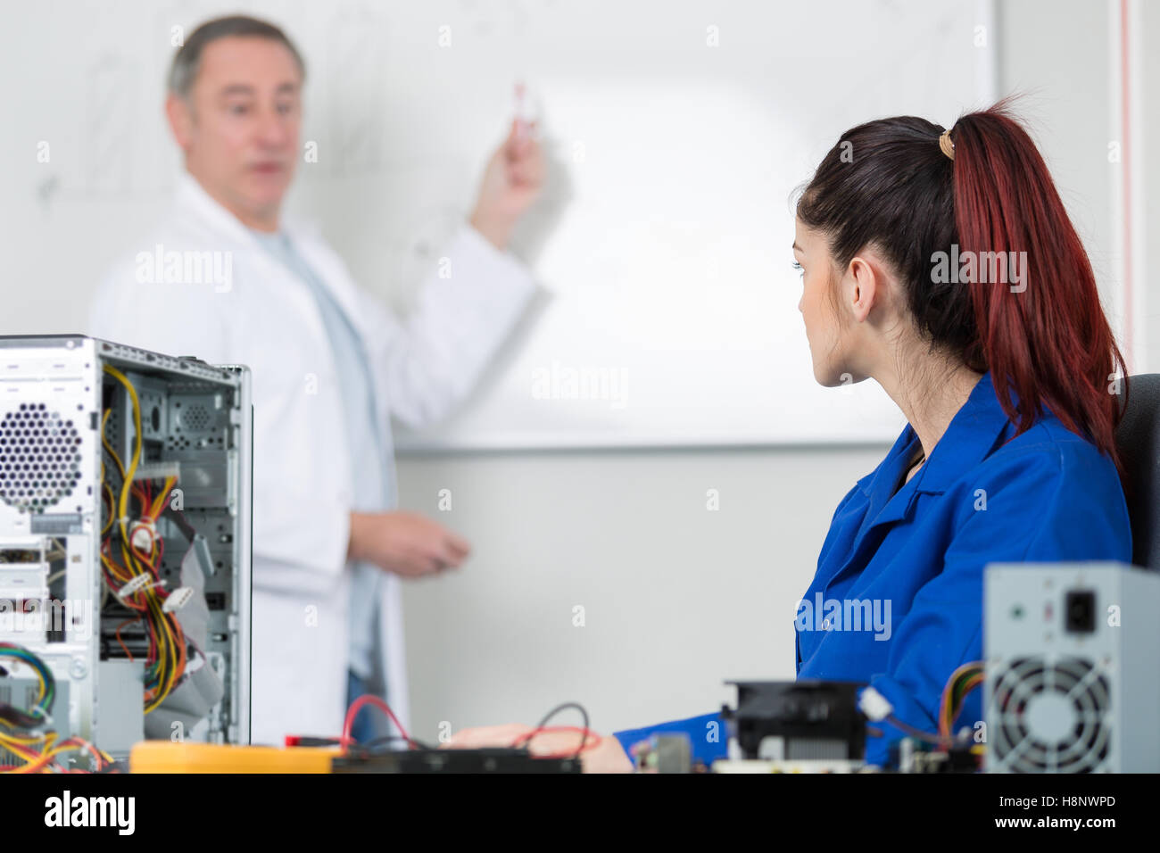 Teen girl repairing computer hi-res stock photography and images - Alamy