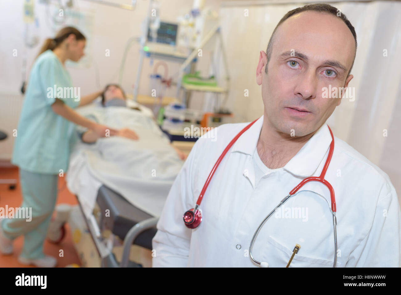 portrait of doctor in hospital room Stock Photo - Alamy