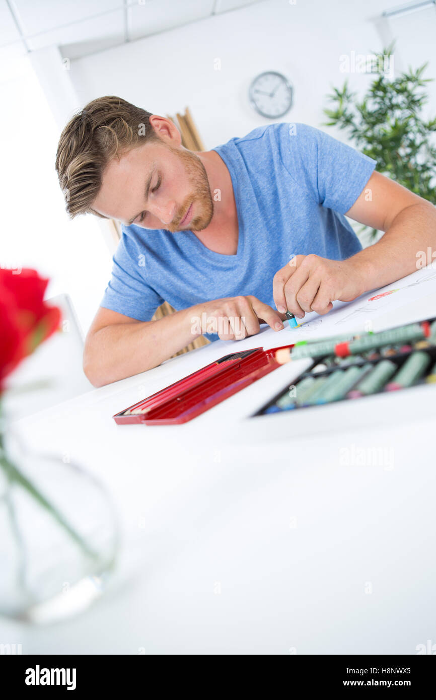 Young man drawing hi-res stock photography and images - Alamy