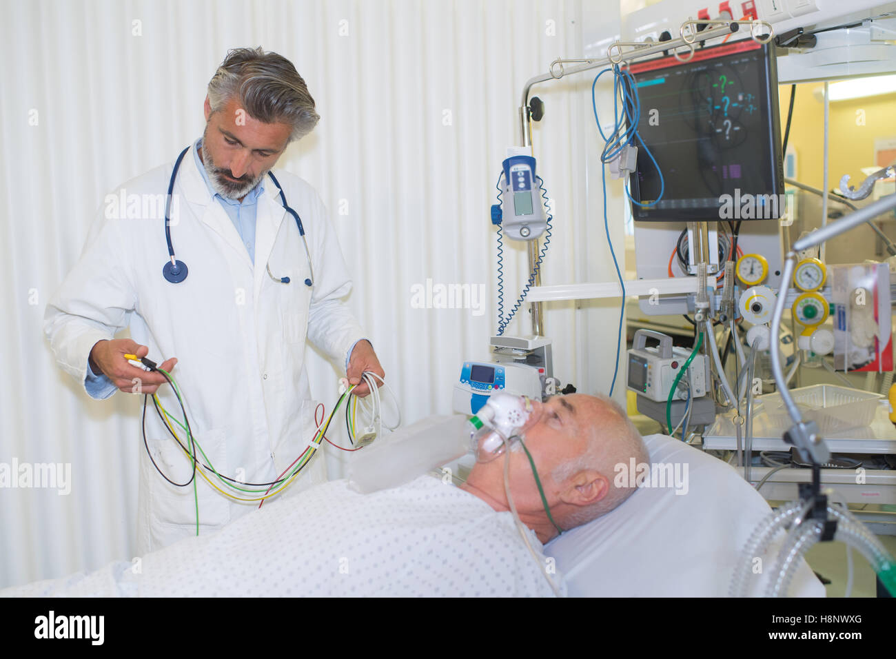 senior doctor with his sick patient Stock Photo - Alamy