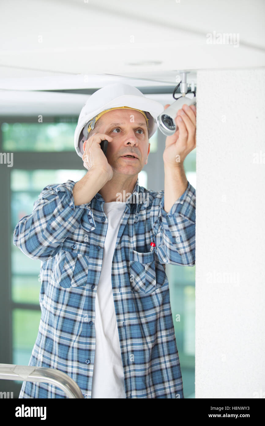 electrical engineer make phone call to control center Stock Photo - Alamy