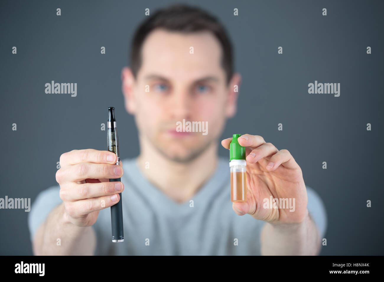 man in laboratory checking test tubes Stock Photo - Alamy