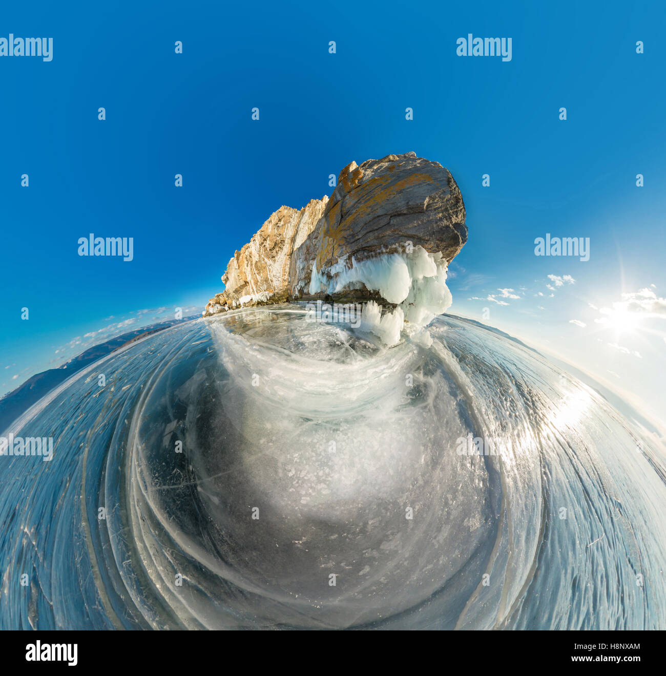 Rock on Olkhon Island on Lake Baikal ice covered on aerial fisheye ...