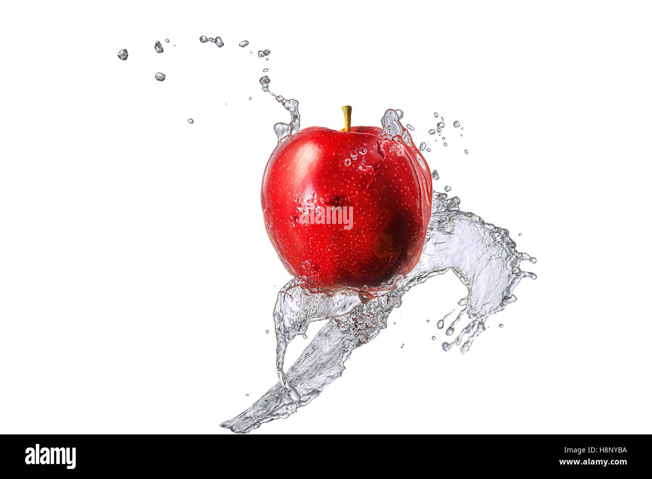 Water splash with apple isolated Stock Photo - Alamy
