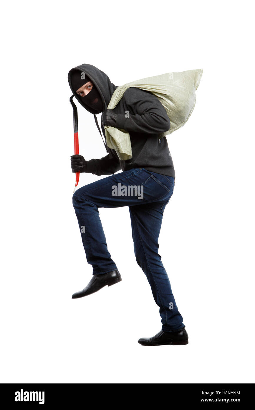 Thief in black mask with sack on blank white background Stock Photo - Alamy