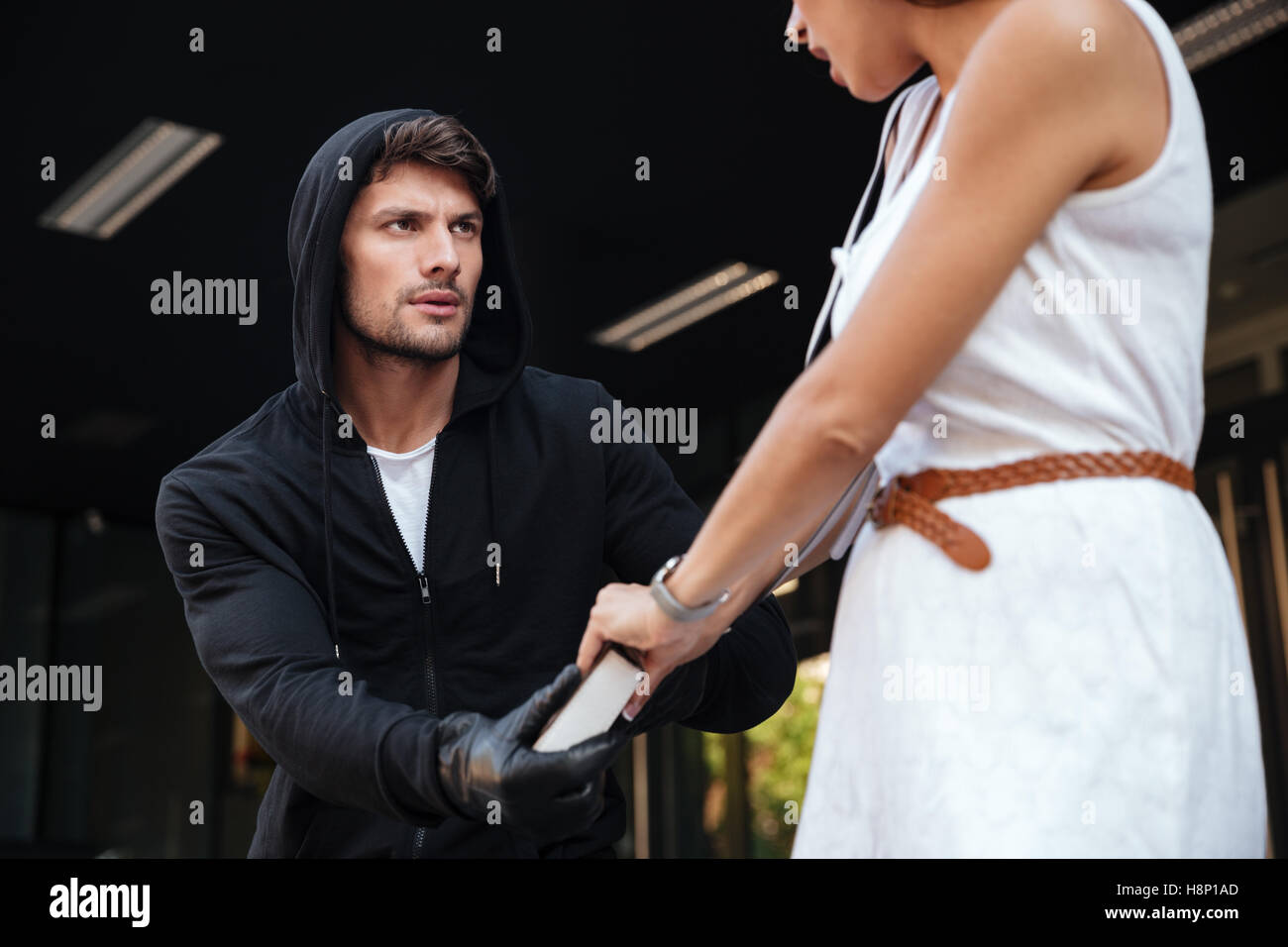 Man stealing girl hi-res stock photography and images - Alamy