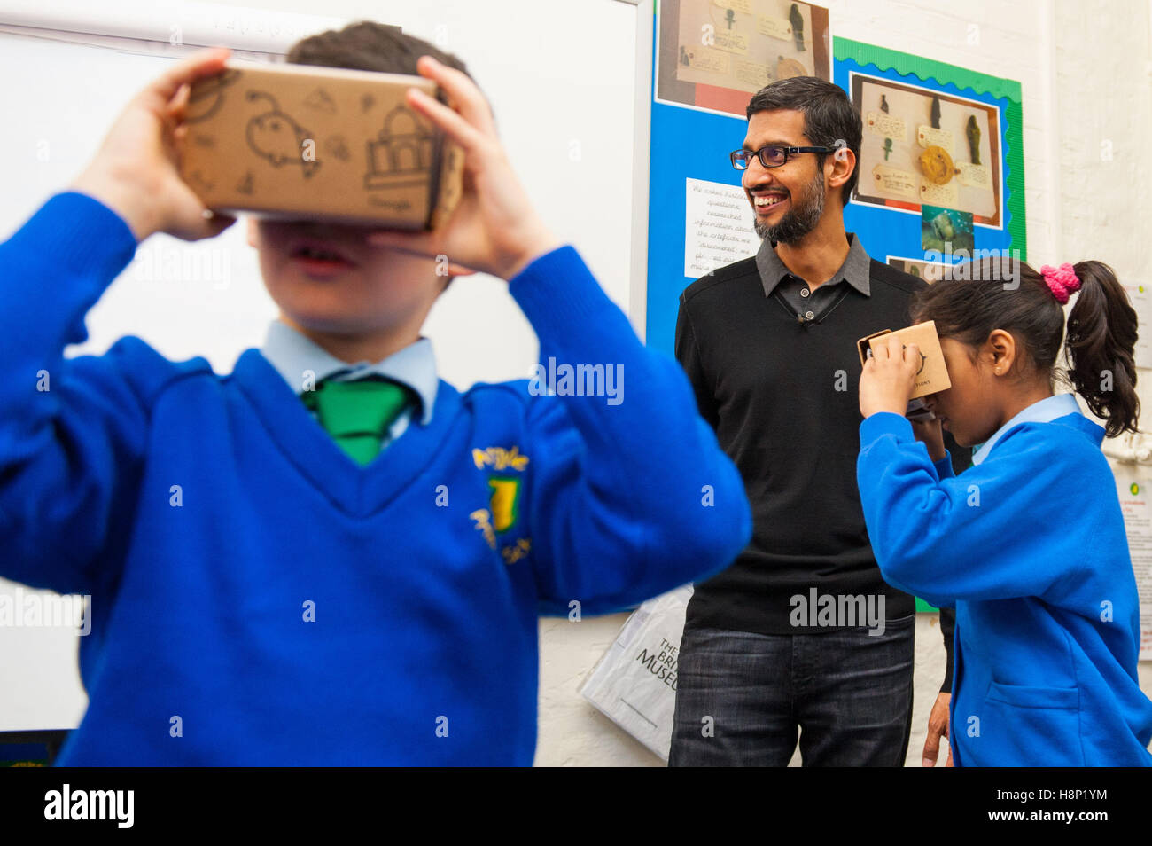 Google CEO Sundar Pichai watches pupils using Google Cardboard VR ...