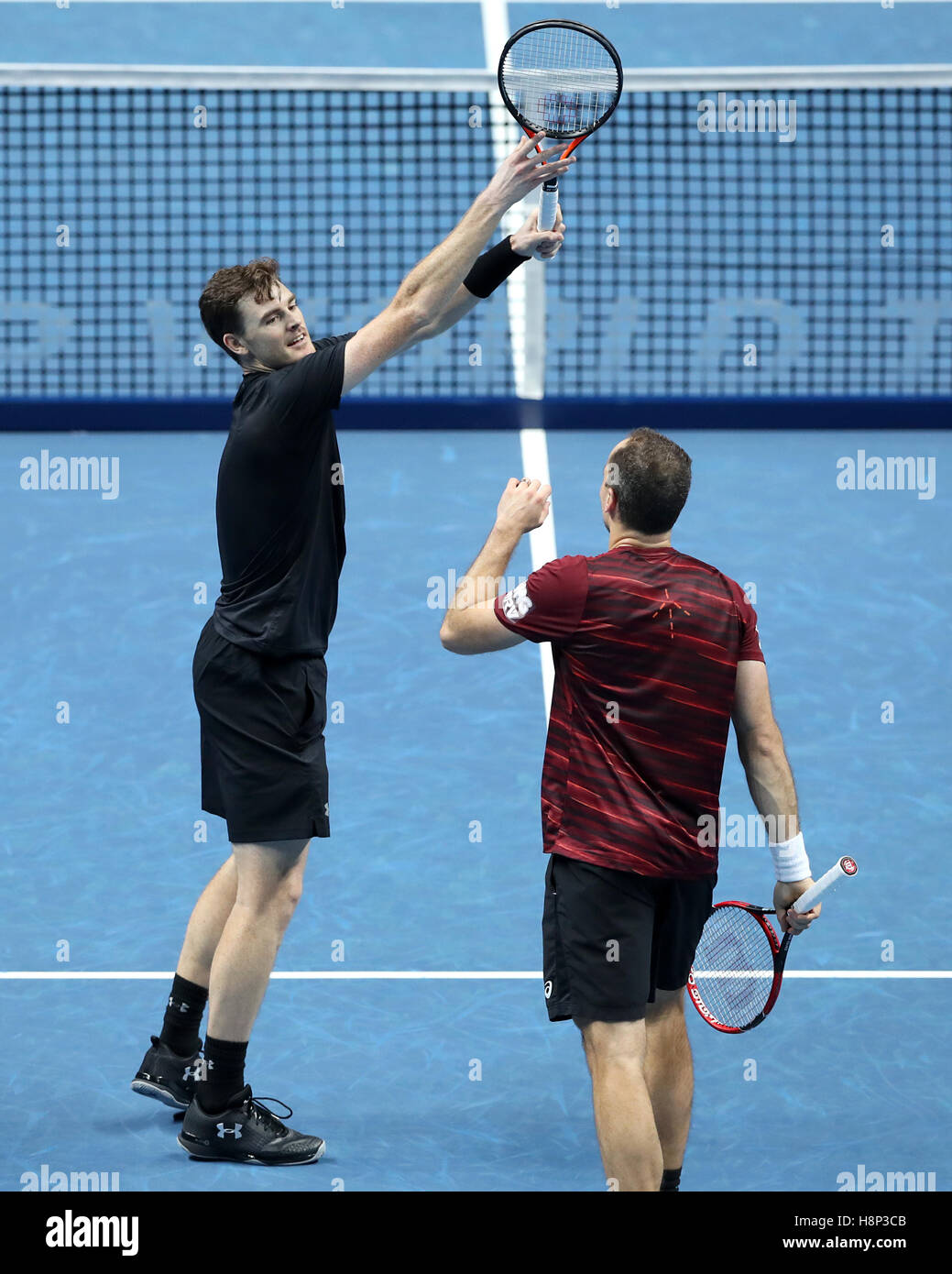 Bruno Soares (right) and Jamie Murray celebrate winning their match ...
