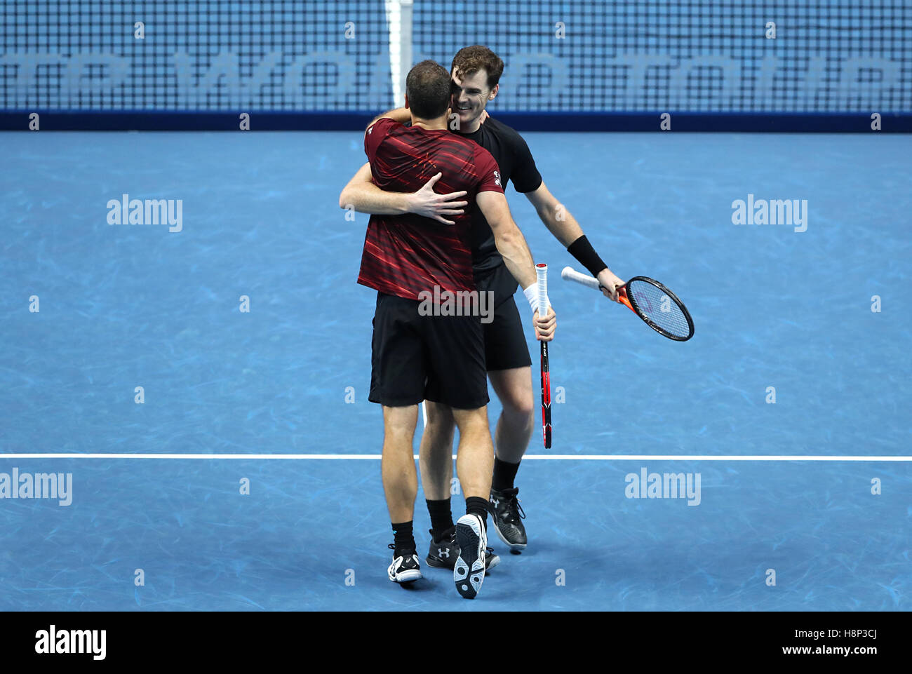 Bruno Soares (left) and Jamie Murray celebrate winning their match ...