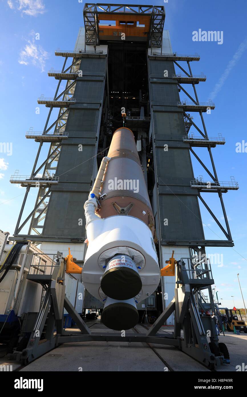 The United Launch Alliance Atlas V rocket first stage is lifted into ...