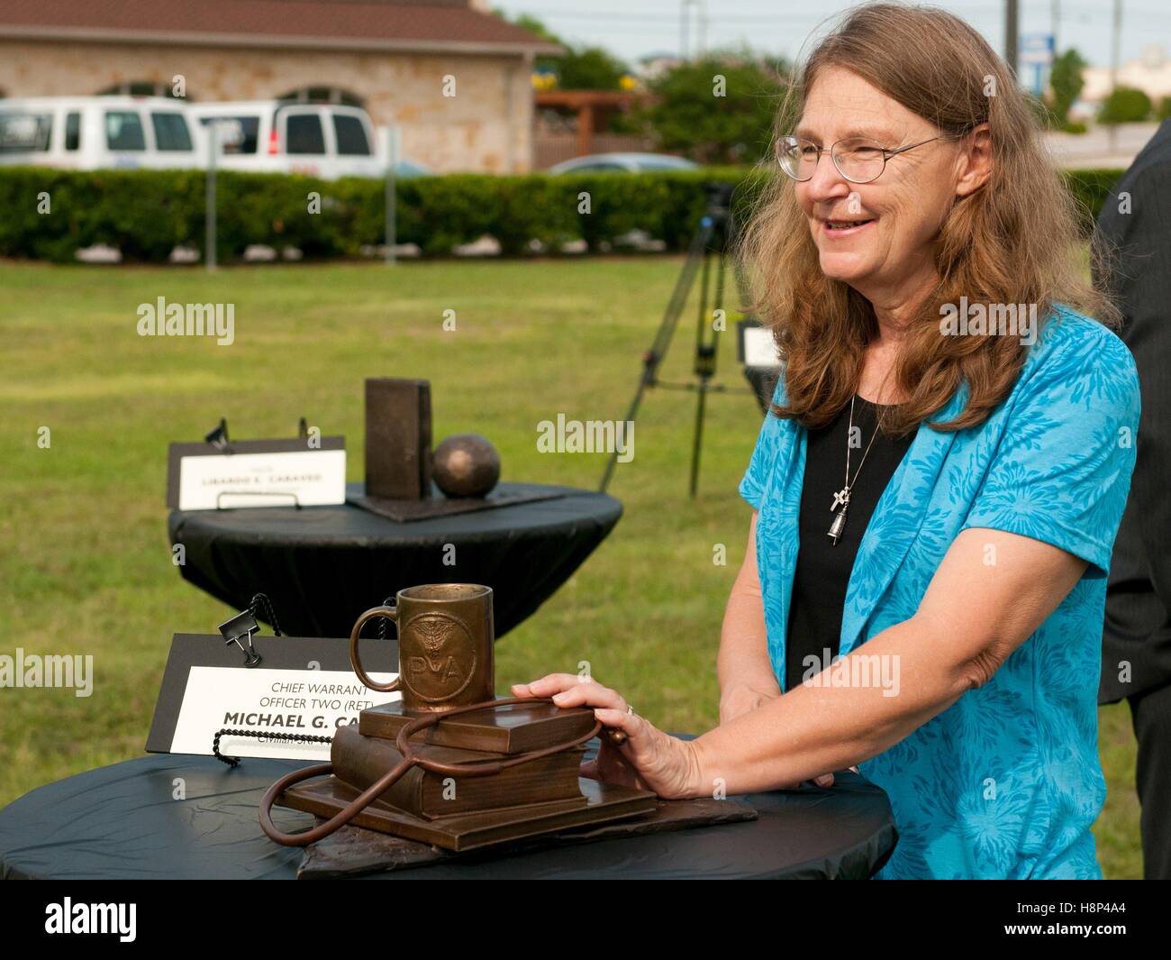 Chief Officer Michael Cahill widow Joleen Cahill touches a memorial ...