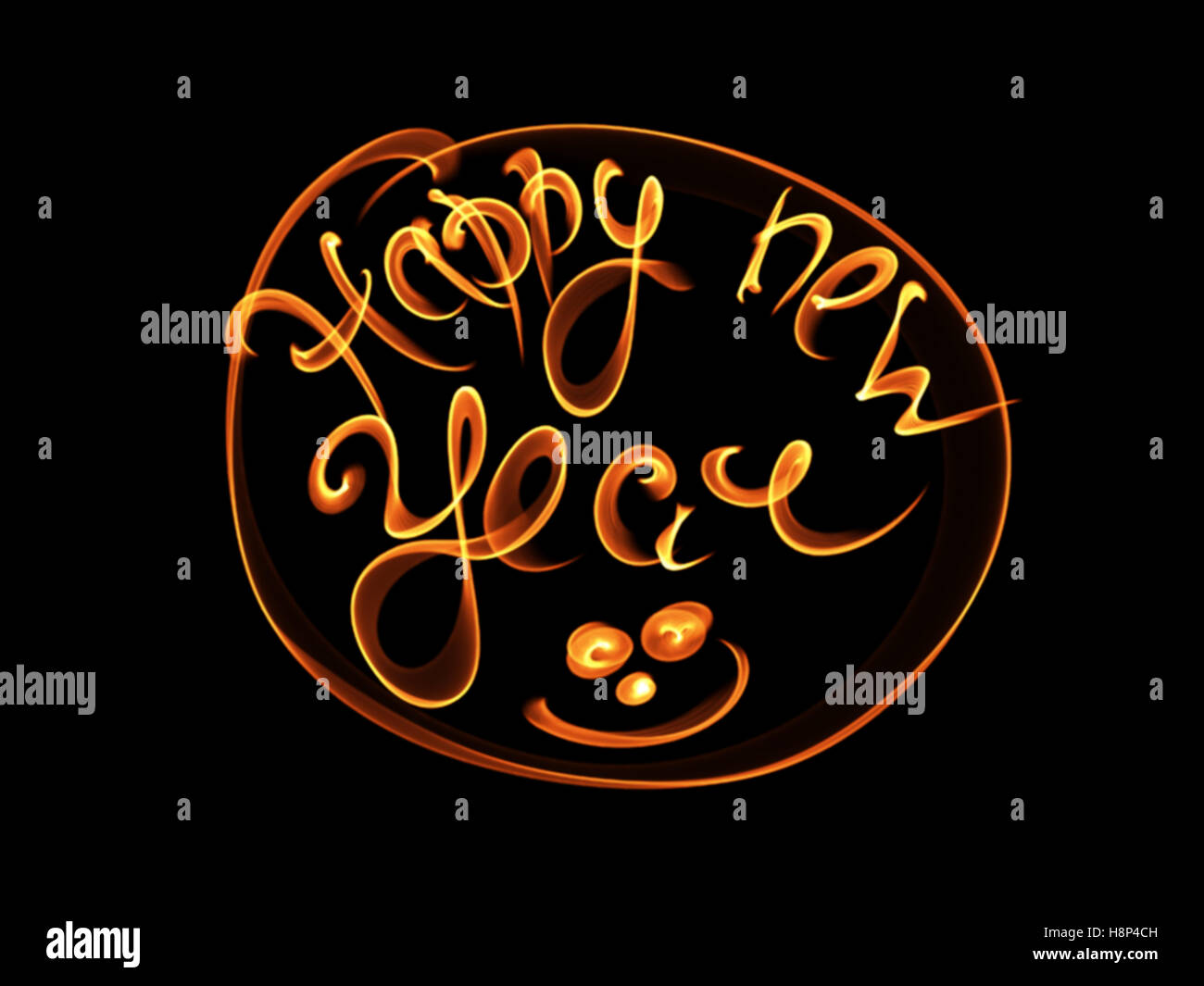 Happy new year isolated words lettering written with fire flame or ...