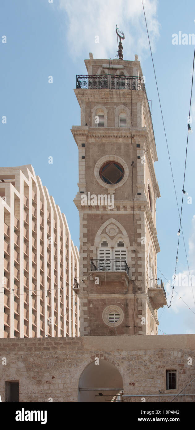 The Al-Jarina Mosque (the big mosque) and its clock tower, with modern ...
