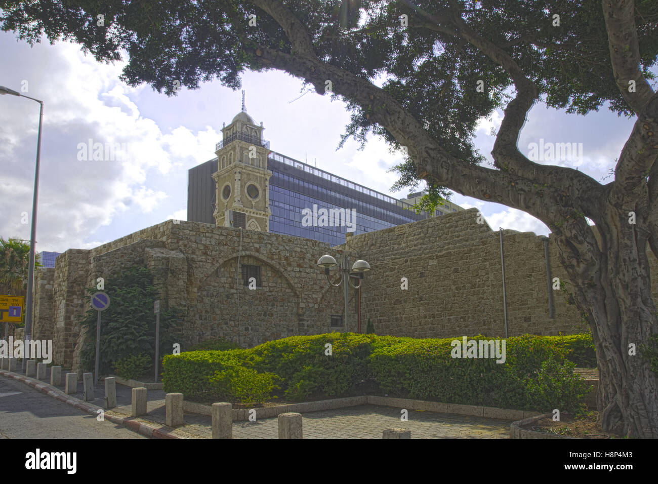 The Al-Jarina Mosque (the big mosque) and its clock tower, with modern ...