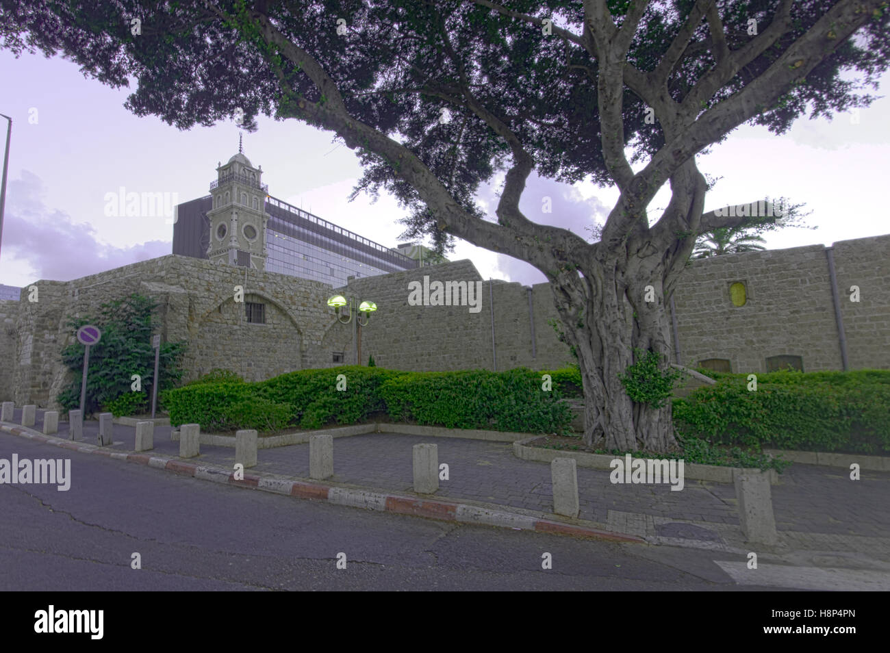 The Al-Jarina Mosque (the big mosque) and its clock tower, with modern ...
