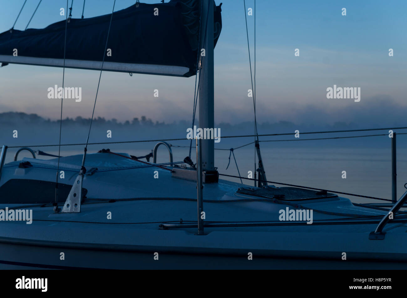 Sailboat in the morning Stock Photo - Alamy