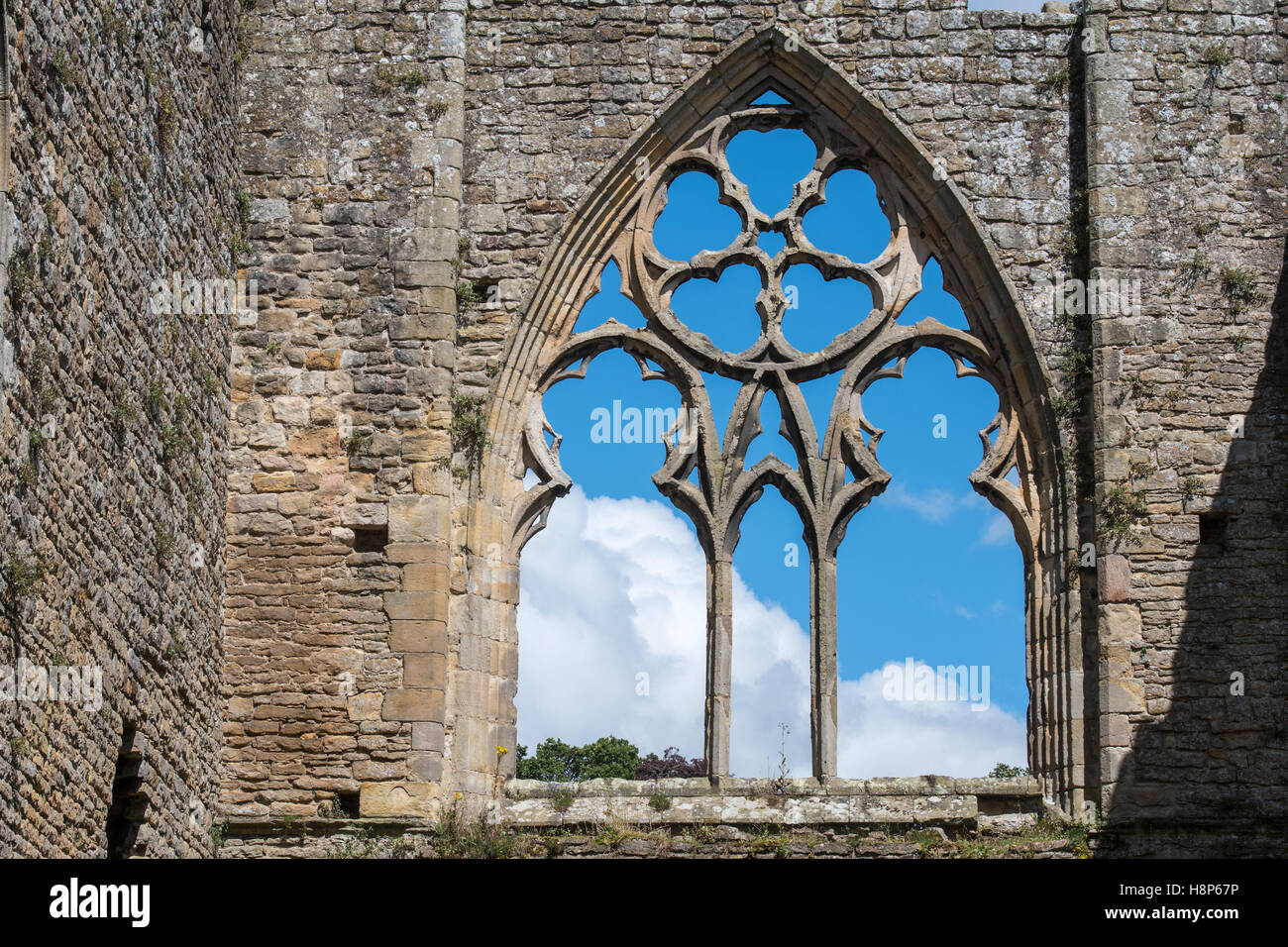 UK, England, Yorkshire, Richmond - A stone window inside the abbey of ...