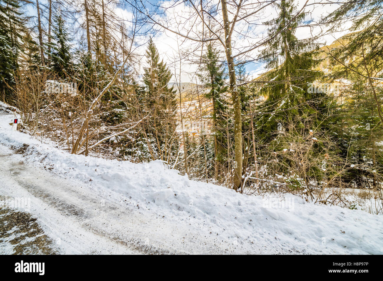 snowy mountain road in the Alps Stock Photo - Alamy