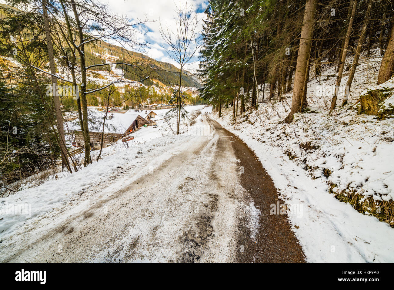snowy mountain road in the Alps Stock Photo - Alamy