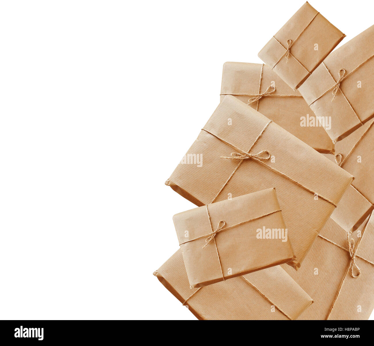 kraft paper tied with string on a white background Stock Photo - Alamy