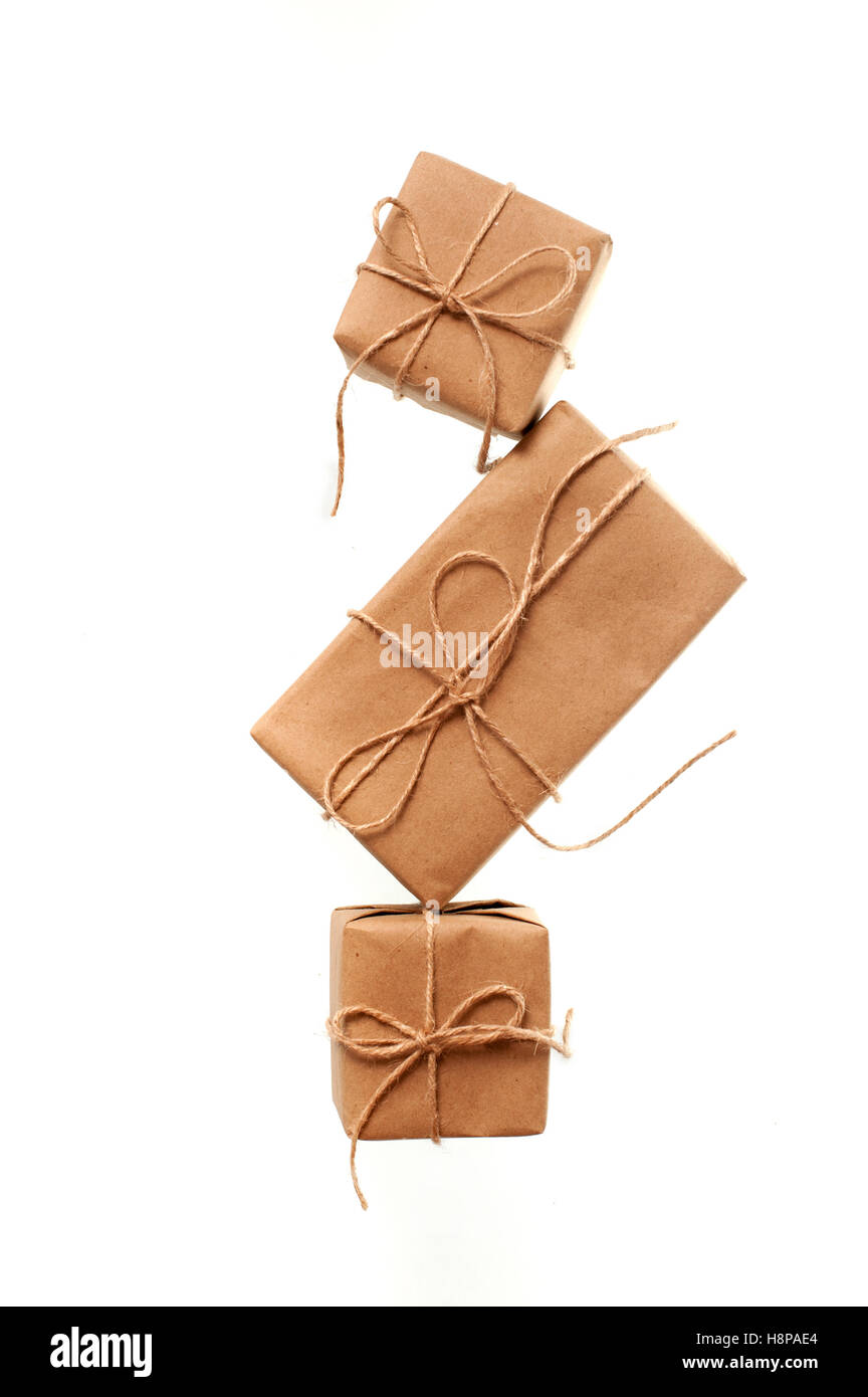 kraft paper tied with string on a white background Stock Photo - Alamy