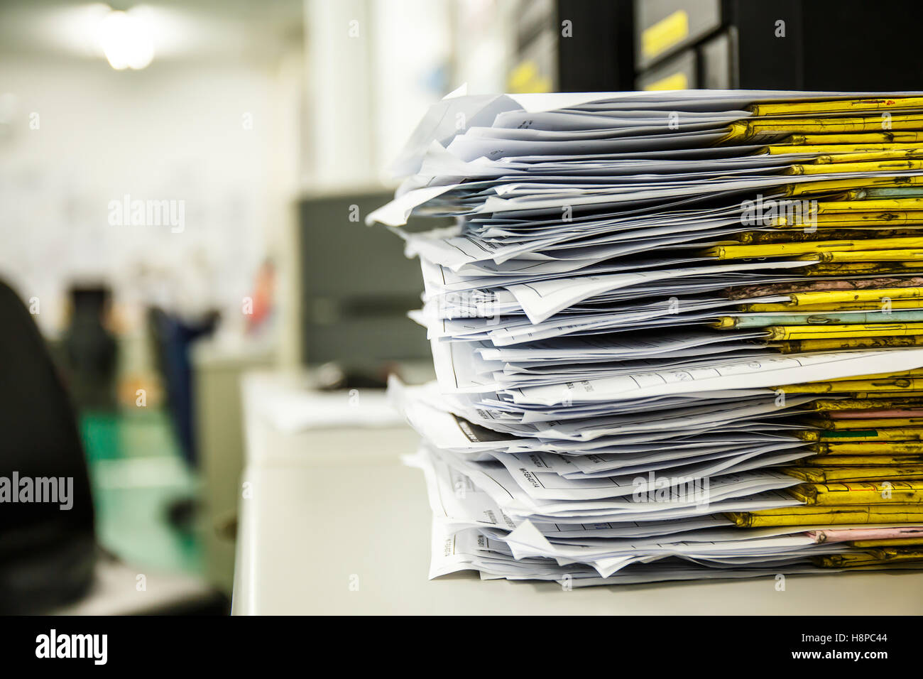A pile of documents Desk Stock Photo - Alamy
