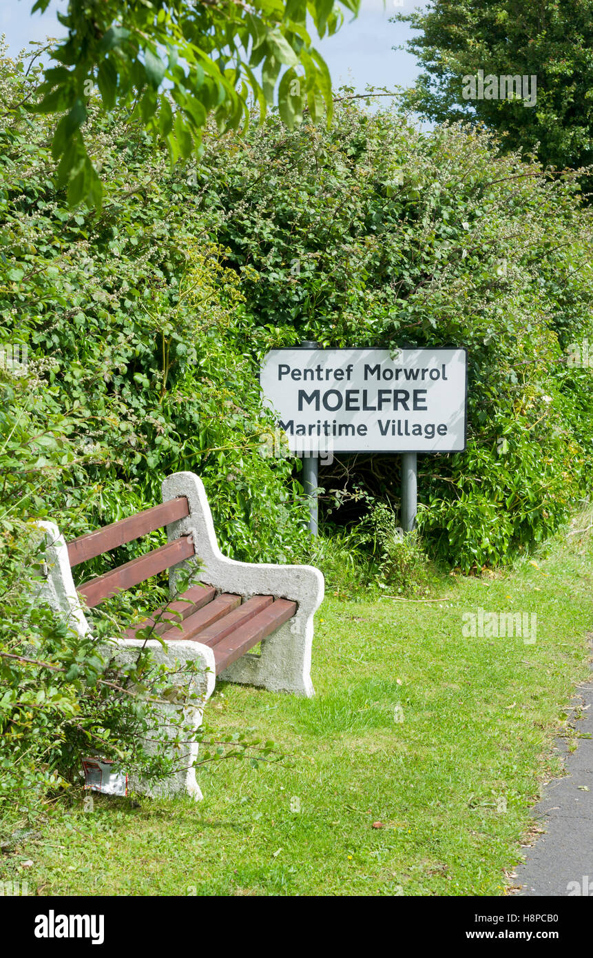 Seating bench and town sign in the maritime village of Moelfre, North ...