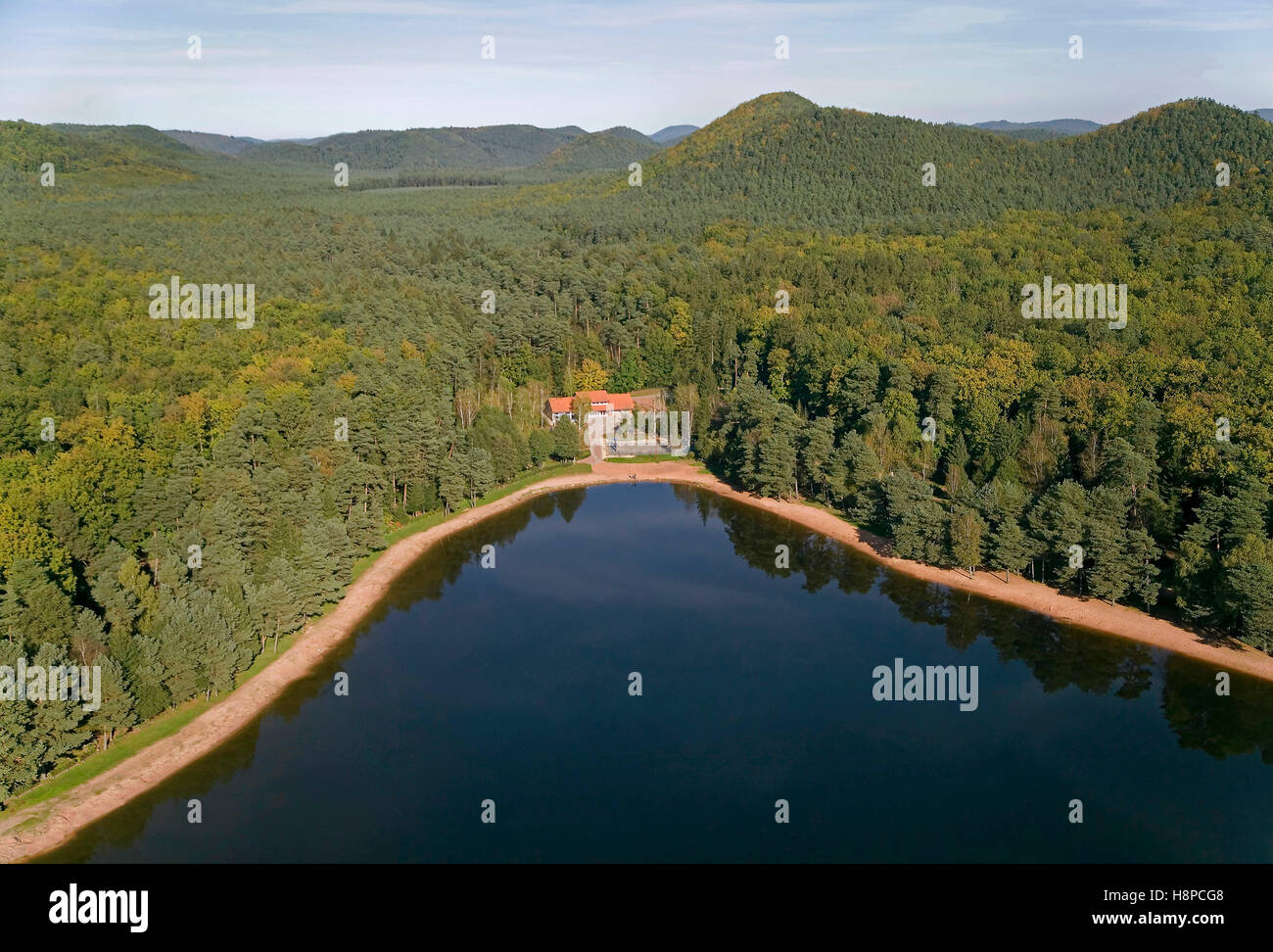 Lake "Etang du Hanau" (north-eastern France): aerial view of the pond ...