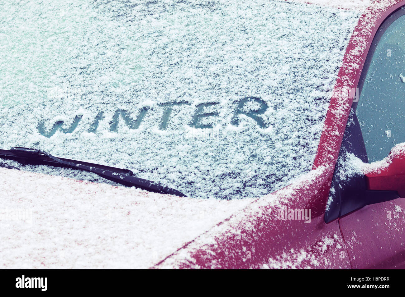 Word Winter written on a car windshield covered with fresh snow Stock ...