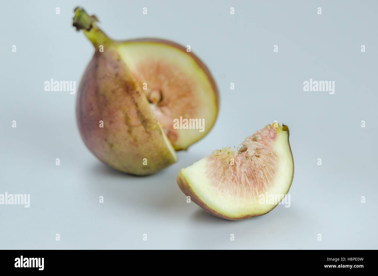 sliced fresh figs fruit on white background Stock Photo - Alamy