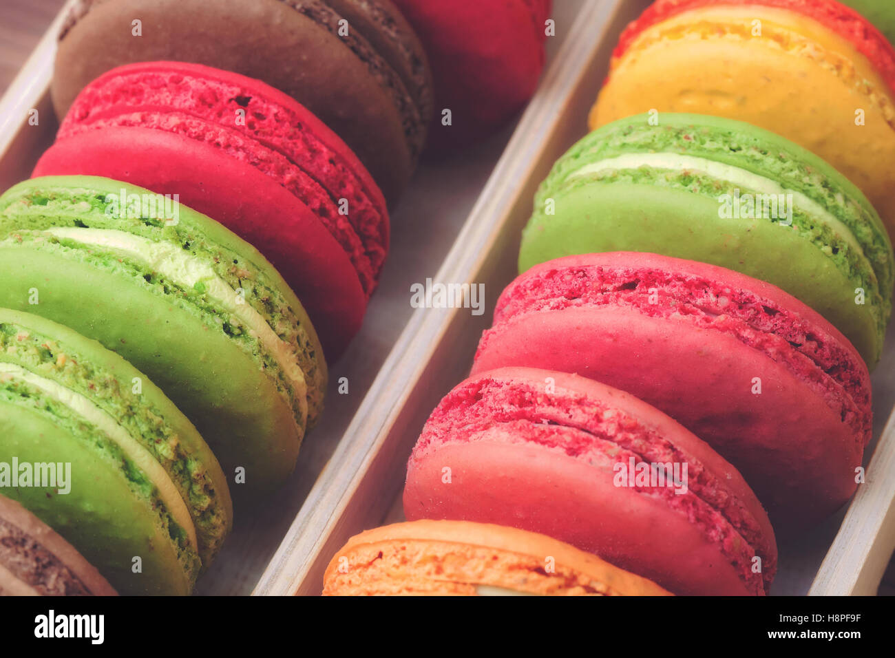 Traditional french colorful macarons in a box, vintage toned Stock ...