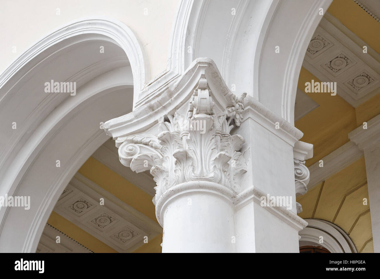 White columns with arches on the facade of the building Stock Photo - Alamy