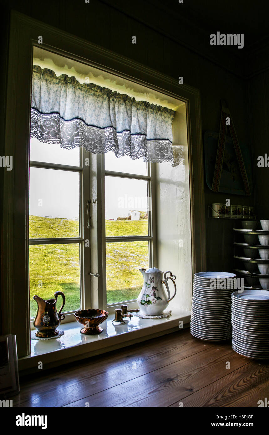 Out a kitchen interior house window sill at the historic Glaumbaer Turf ...