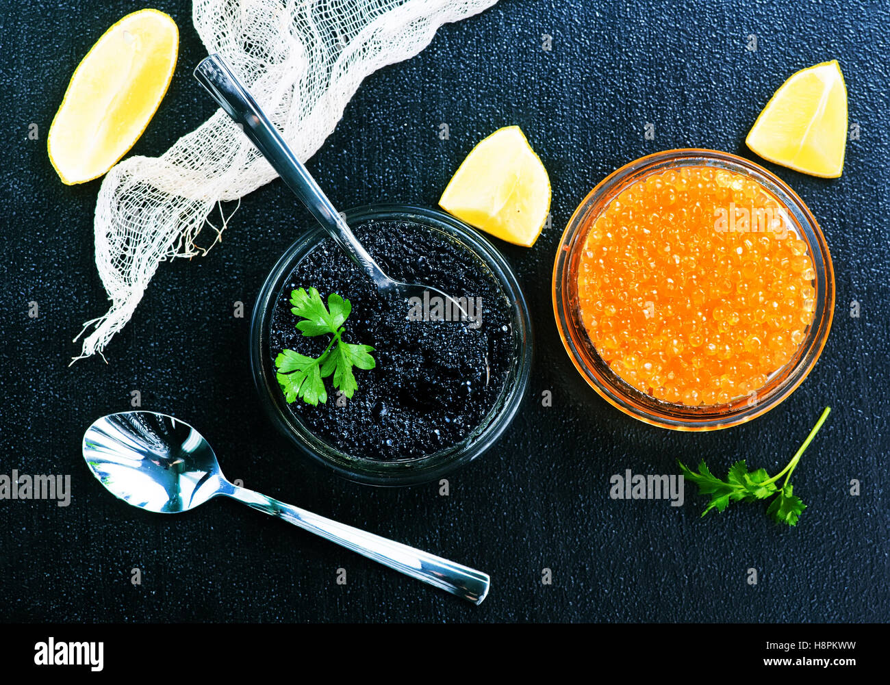 caviar in glass bowls and on a table Stock Photo - Alamy