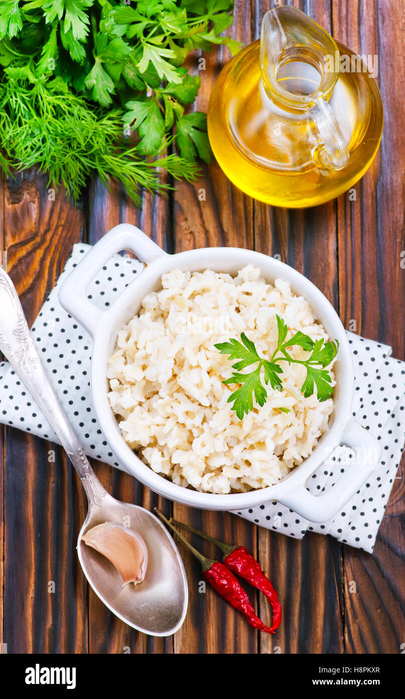 boiled rice in bowl and on a table Stock Photo - Alamy