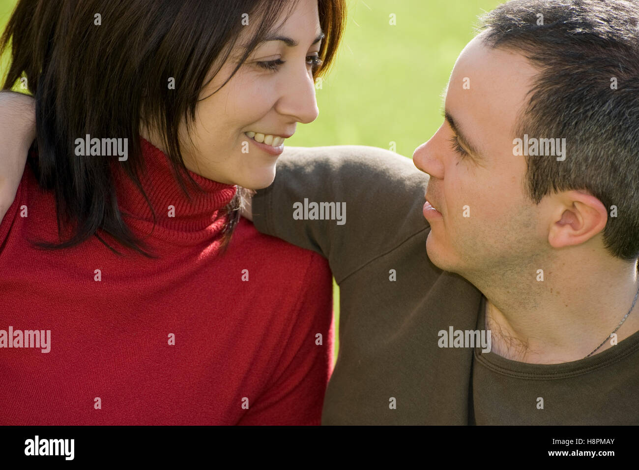 Couple smiles lovingly other in hi-res stock photography and images - Alamy
