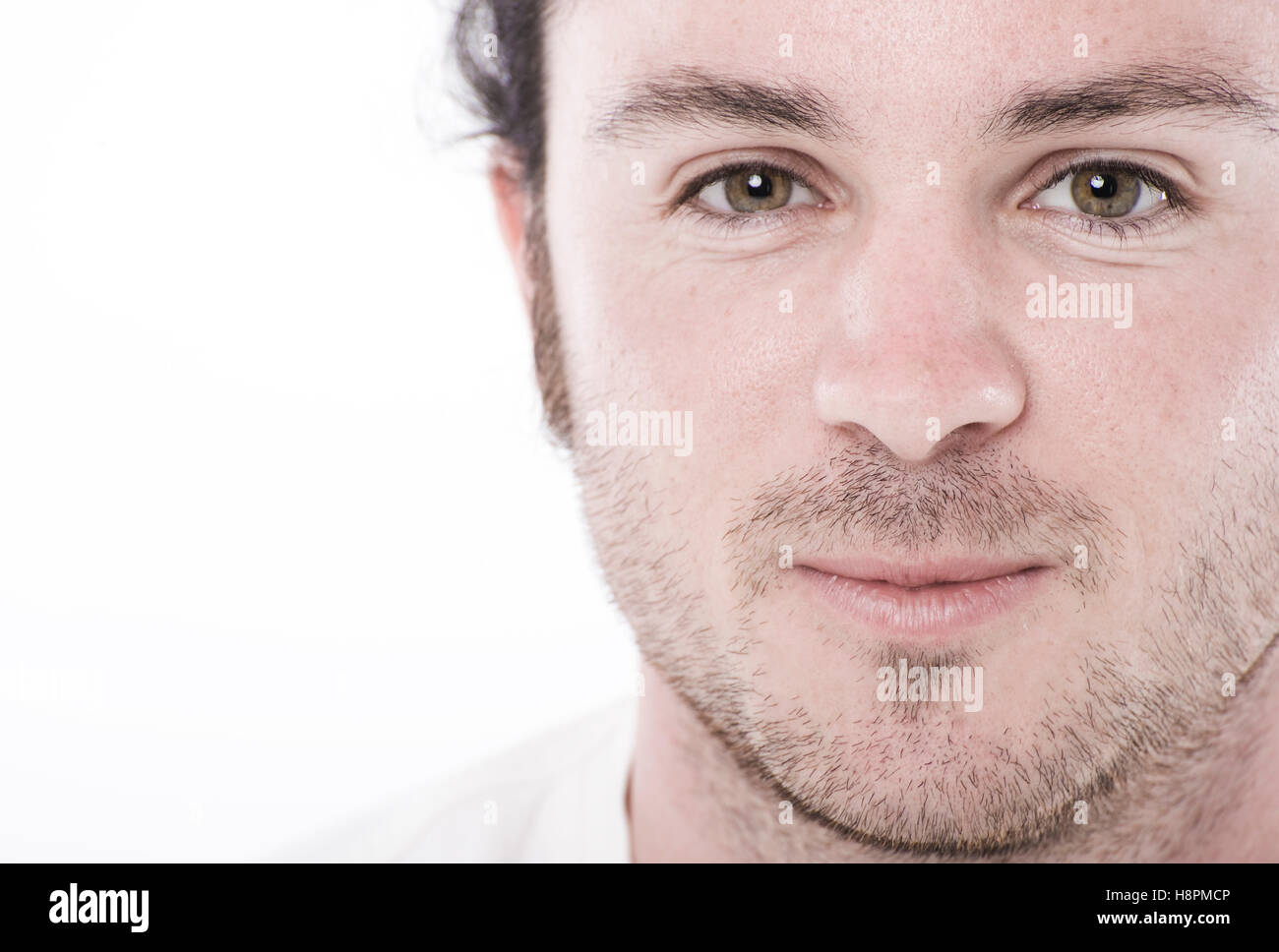 Portrait of a man, 25, with three-day stubble Stock Photo - Alamy